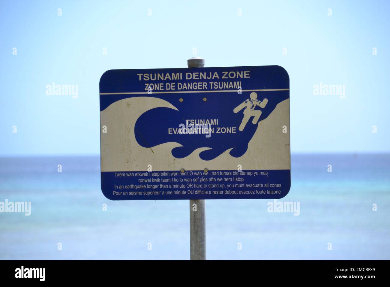 Single sign with warning and tsunami information on the waterfront ...
