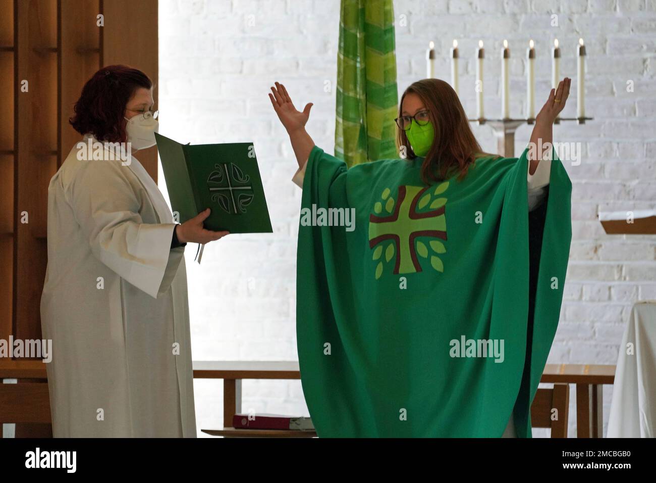 Lead Pastor Rev. Miriam Samuelson-Roberts, right, officiates the ...
