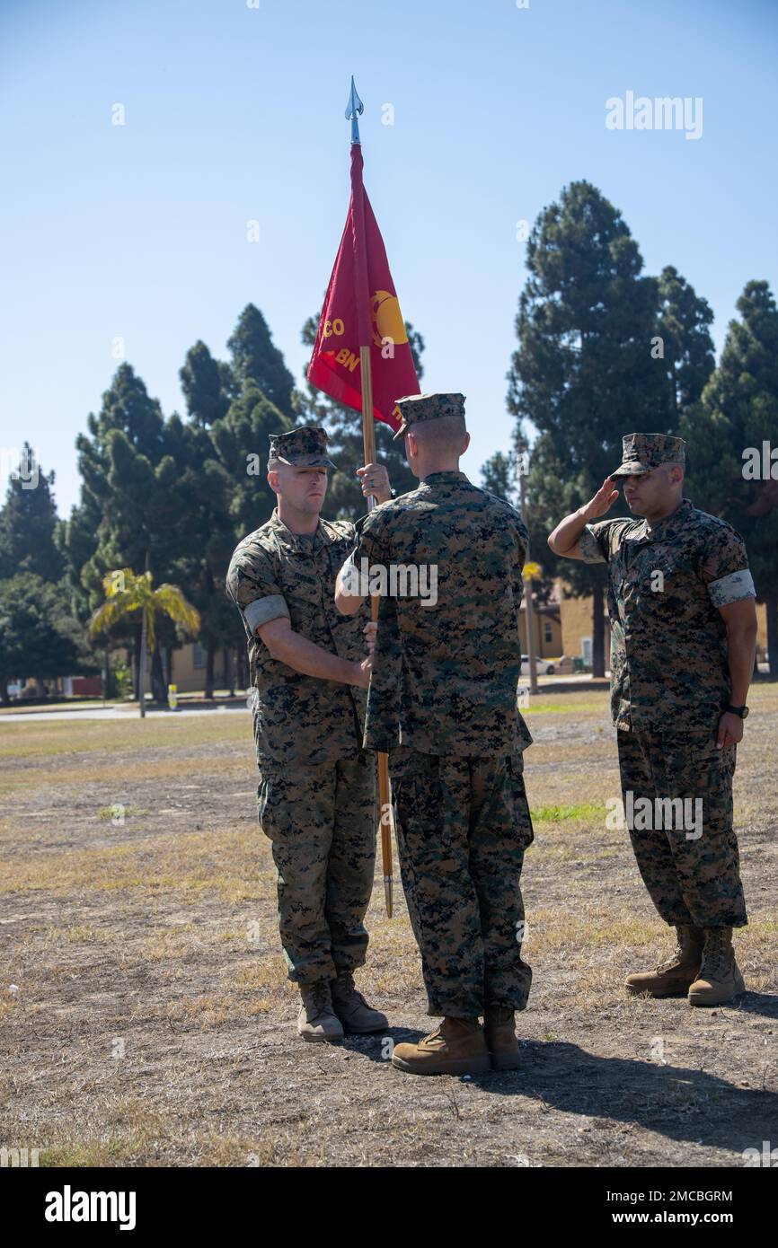 U.S. Marine Corps Maj. Christopher Rork, right, passes the company ...