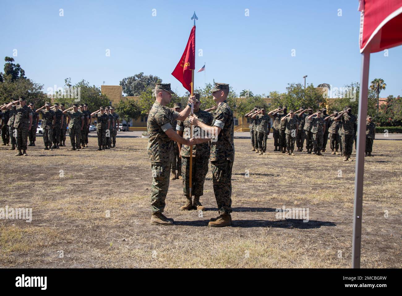 U.S. Marine Corps Maj. Christopher Rork, right, passes the company ...