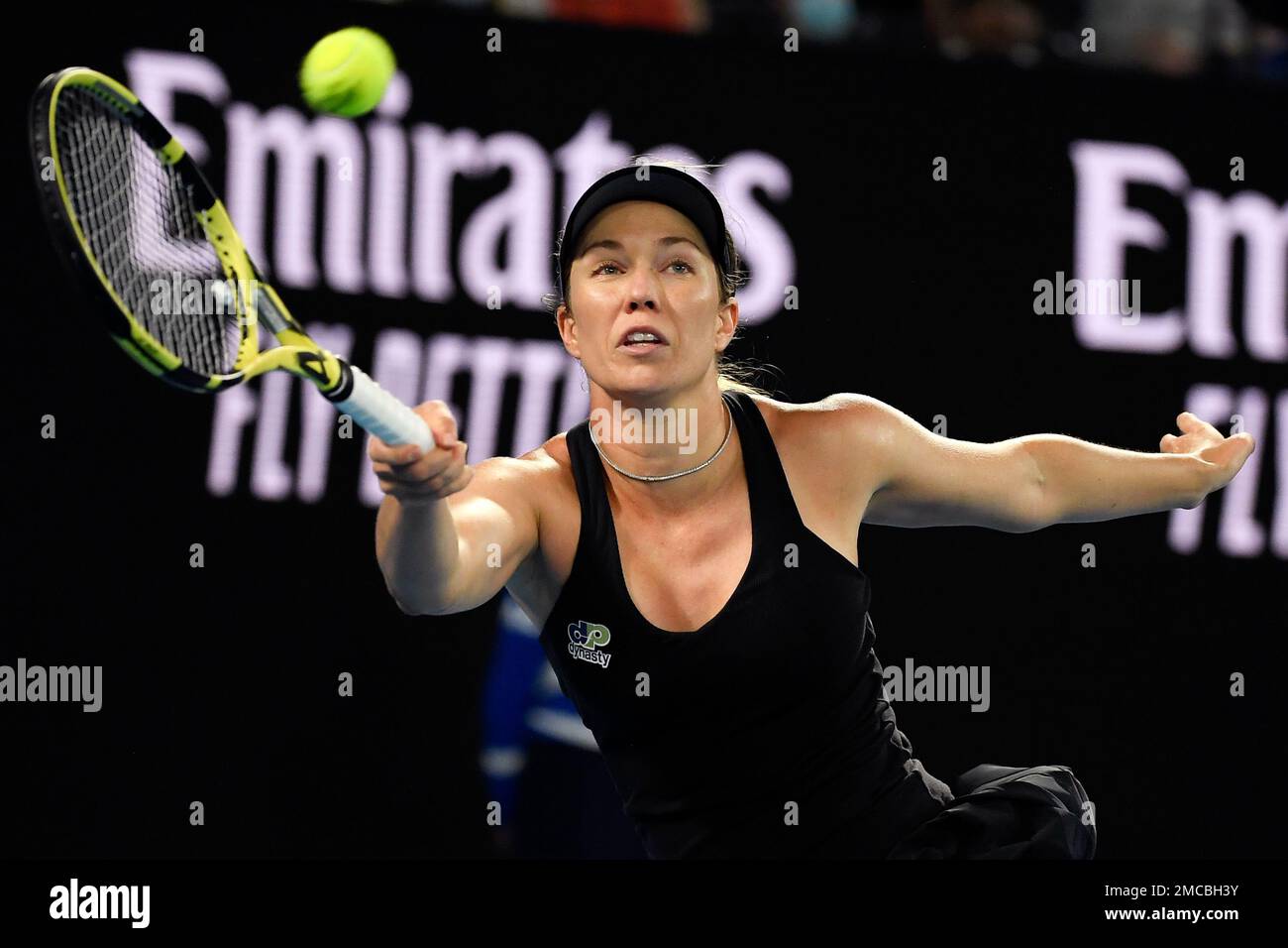 Danielle Collins of the U.S. plays a forehand return to Ash Barty of Australia during the women ...