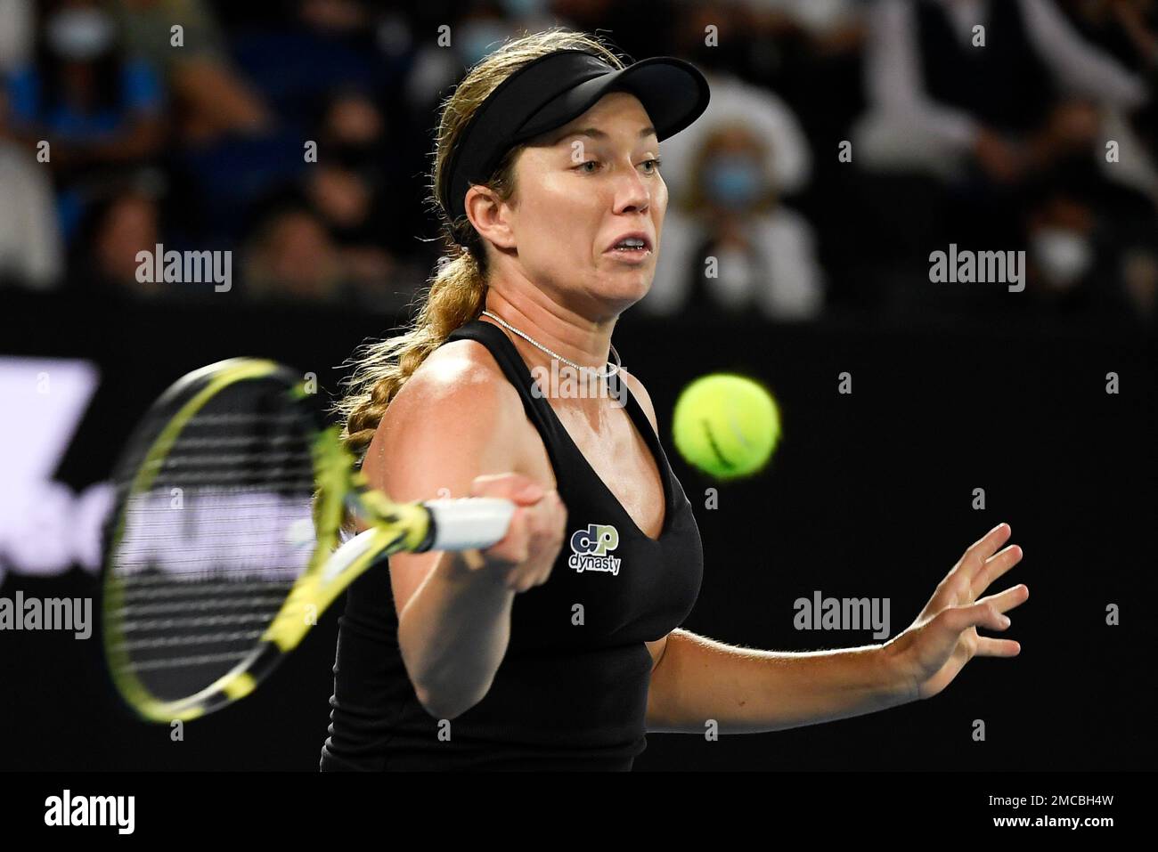 Danielle Collins of the U.S. plays a forehand return to Ash Barty of Australia during the women ...