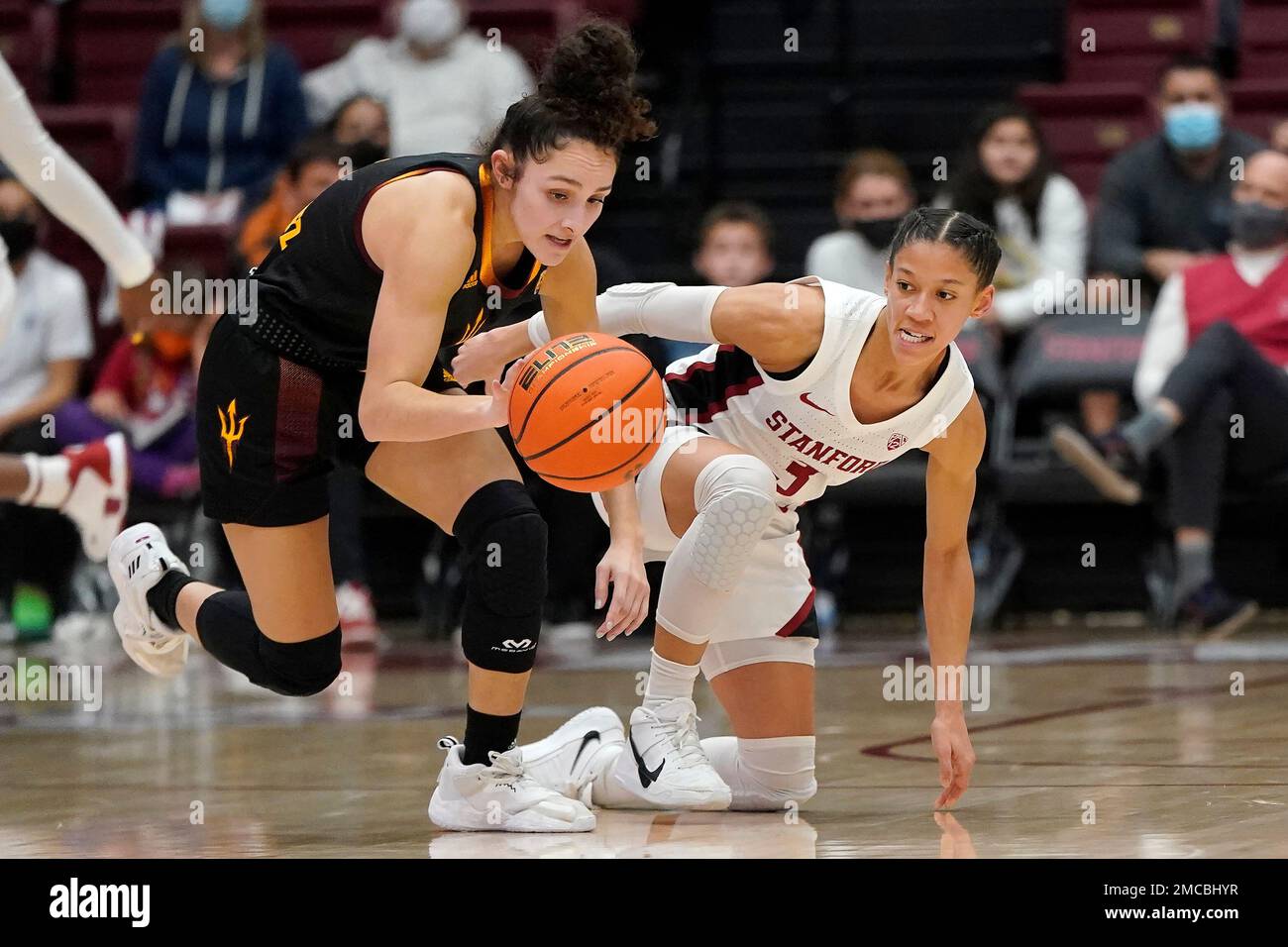 Arizona State guard Gabriela Bosquez, left, reaches for the ball in ...