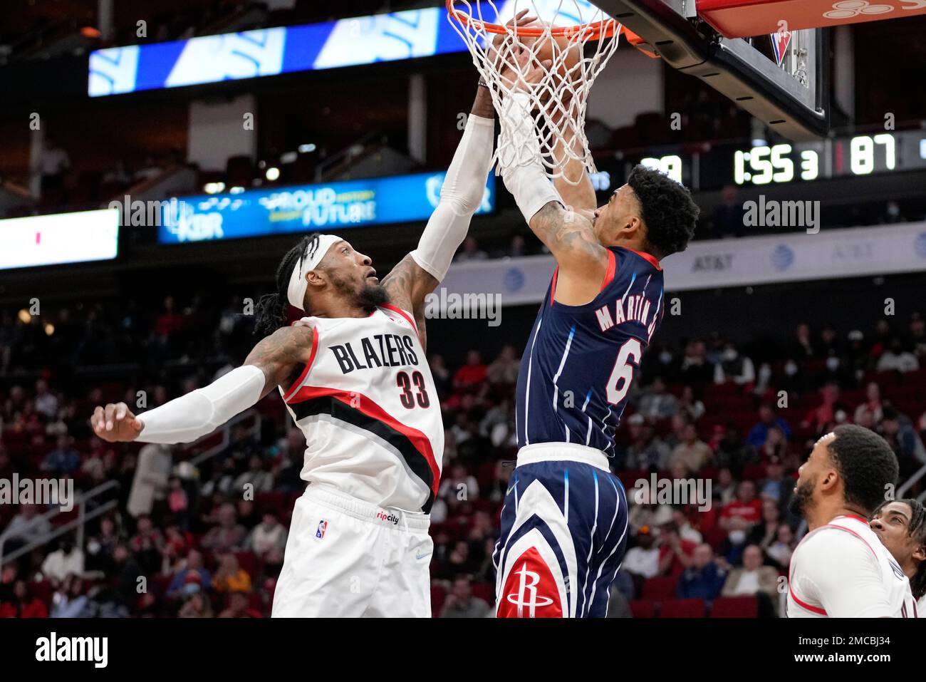 Portland Trail Blazers forward Robert Covington (33) blocks a shot by ...