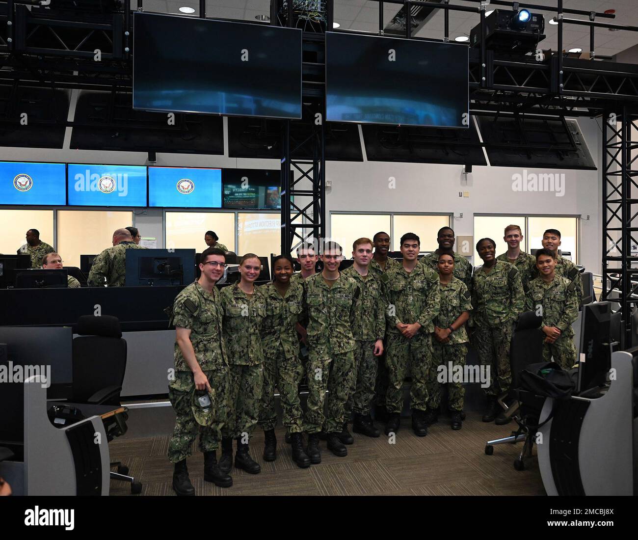 One half of the second wave of Midshipmen stand for a photo just prior ...