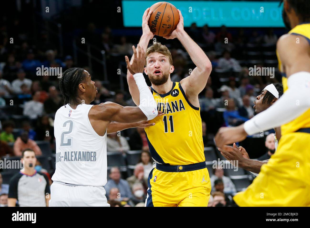 Indiana Pacers center Domantas Sabonis (11) takes the ball to the ...