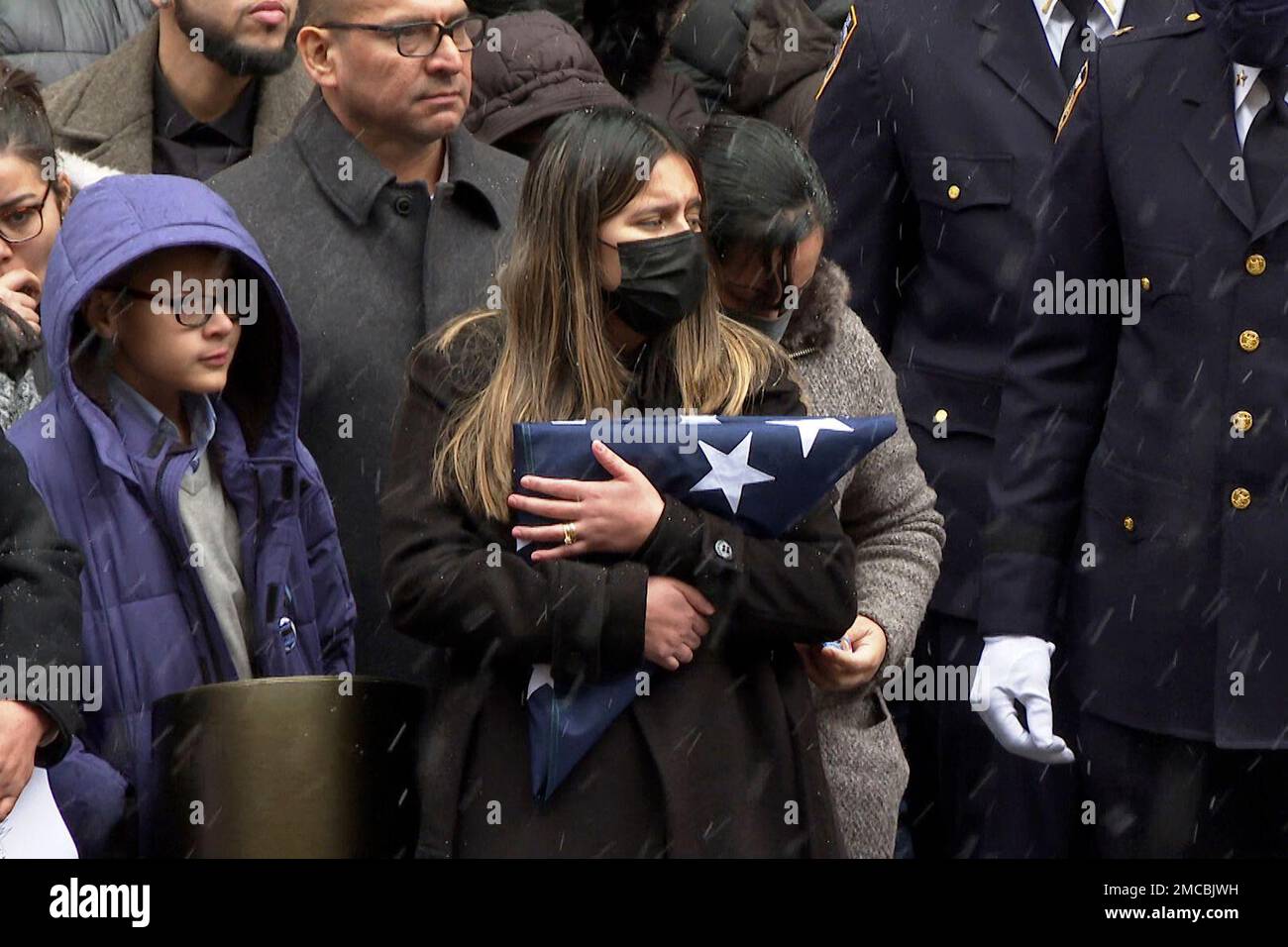 Dominique Luzuriaga, the wife of slain NYPD Officer Jason Rivera, holds ...