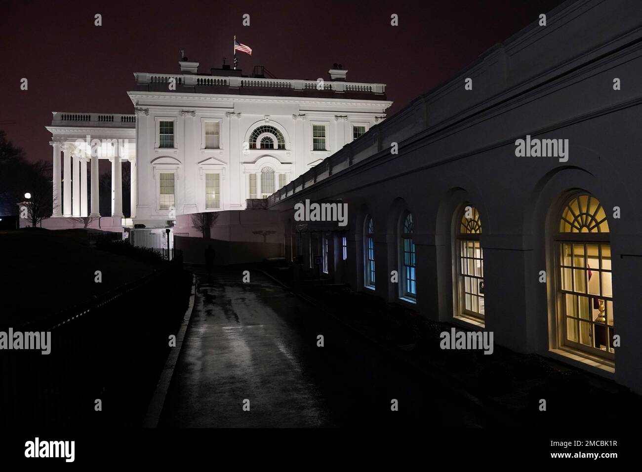 Light rain falls outside the White House, Friday, Jan. 28, 2022, in ...