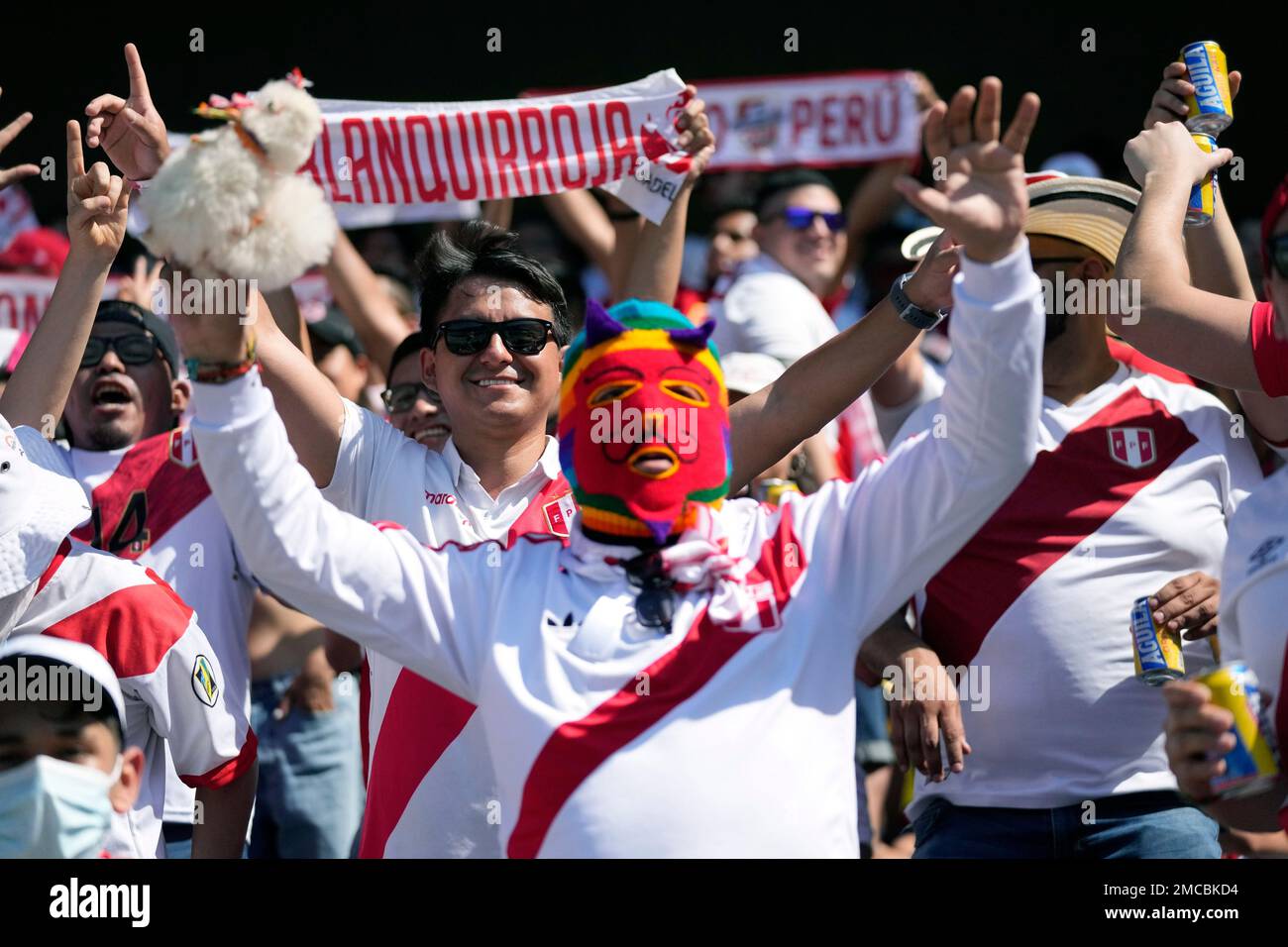 Peruvian fans cheer prior to a qualifying soccer match between Peru and ...
