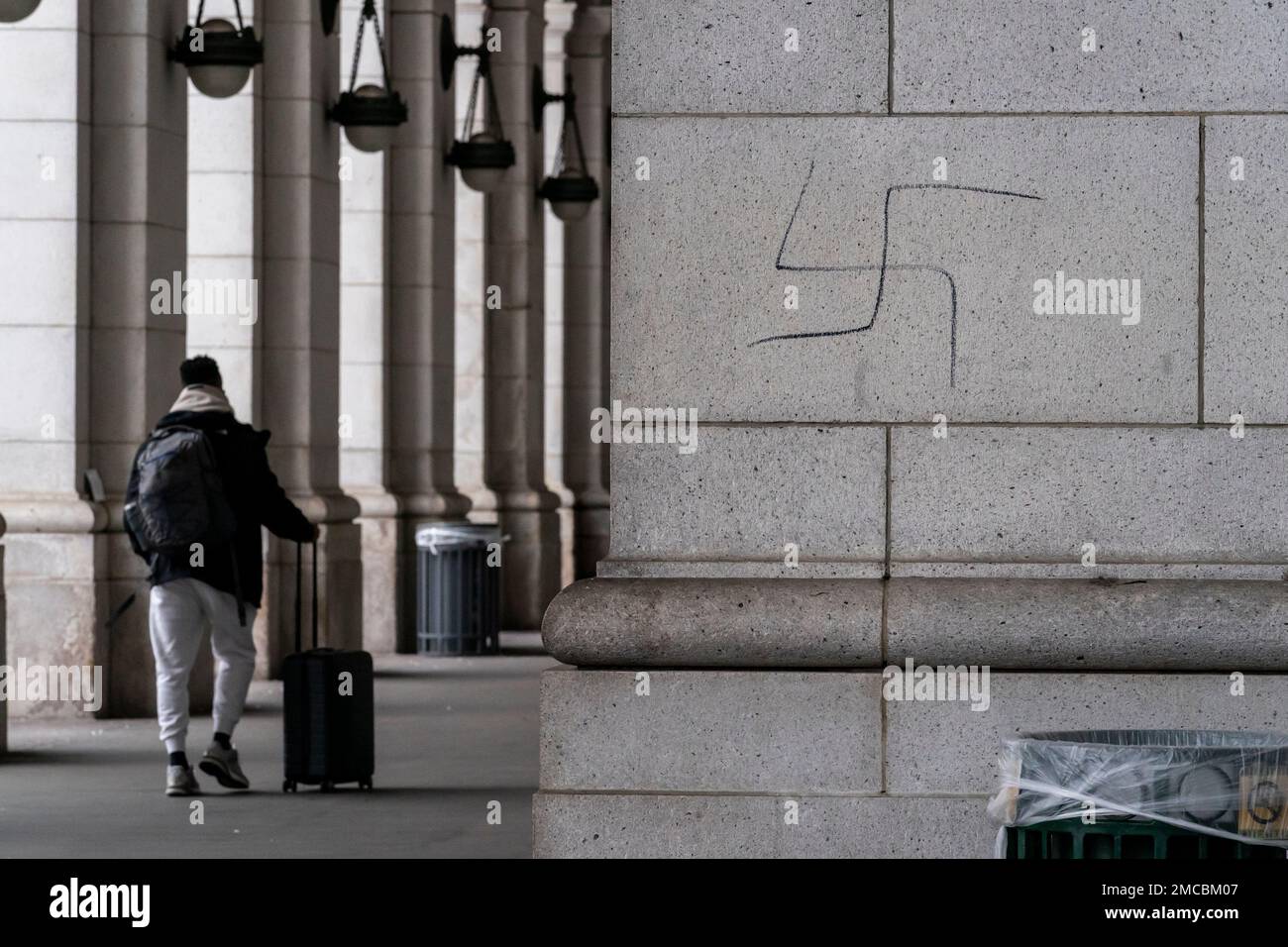 A hand-drawn swastika is seen on the front of Union Station near the ...