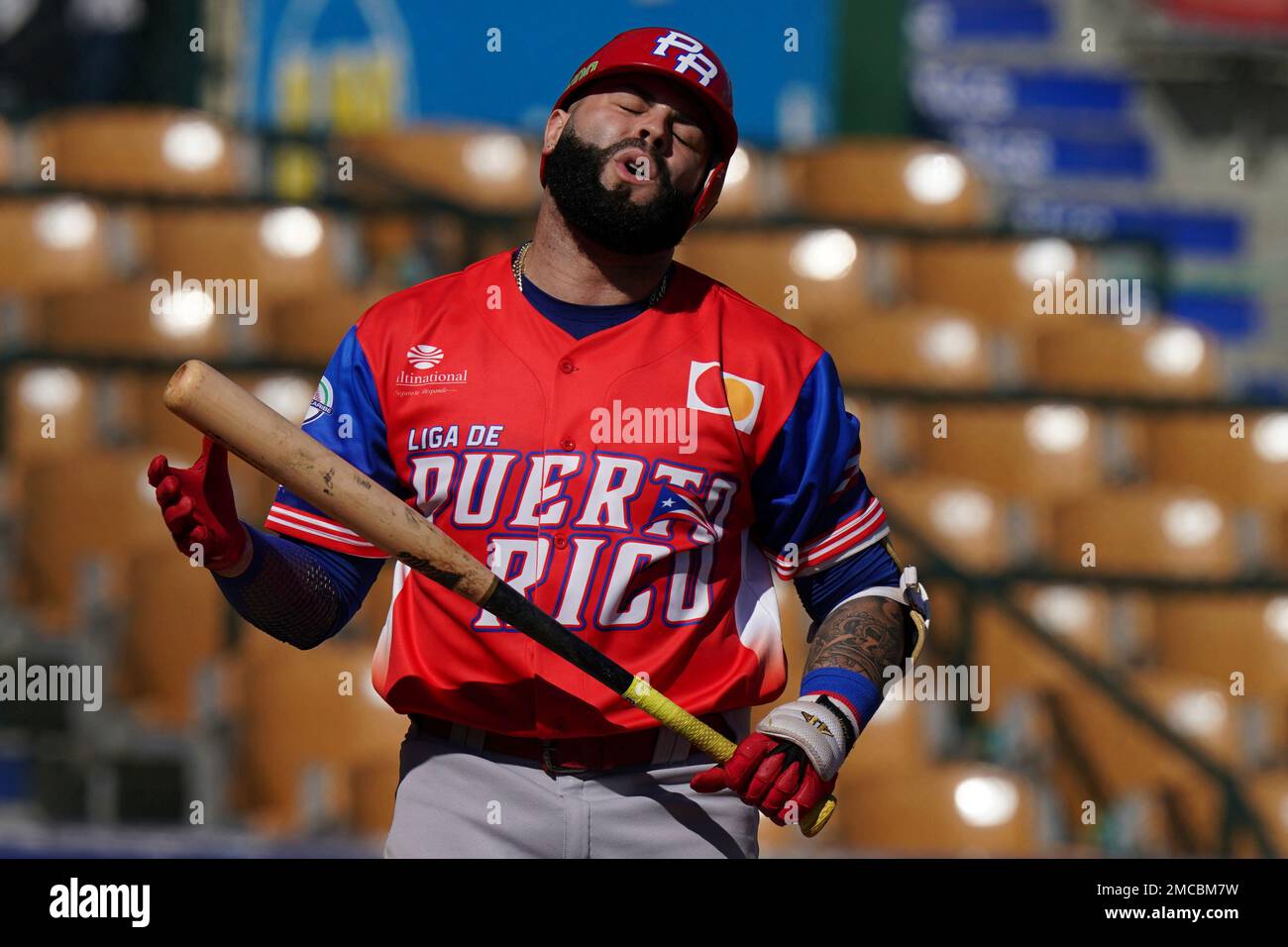 Puerto Rico's baseman Emmanuel Rivera reacts after striking out during ...