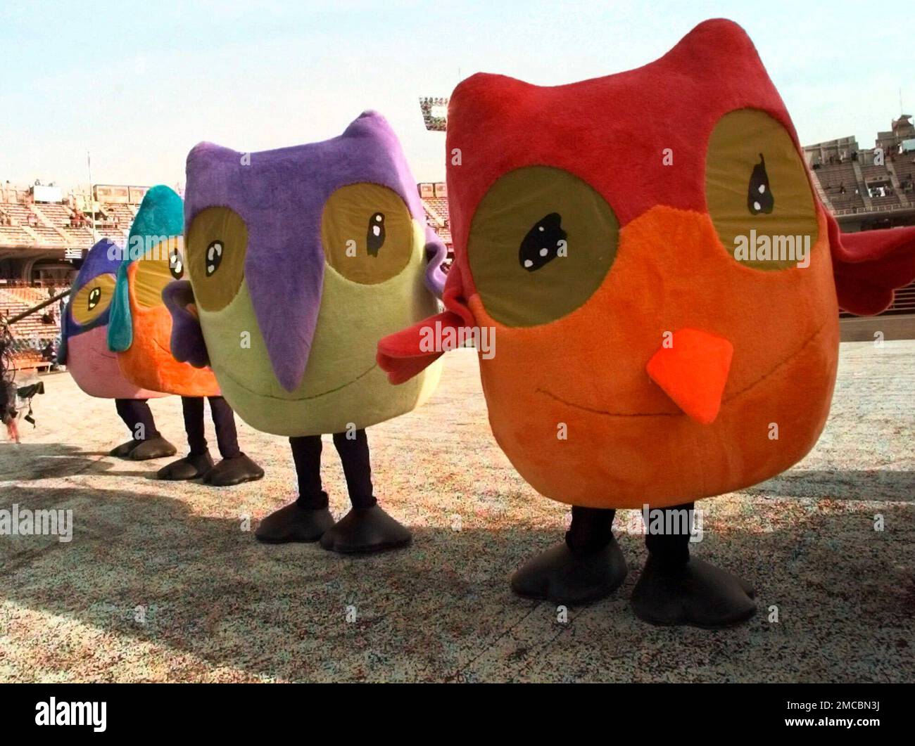 Snowlets, the Olympic mascots, walk around the stadium prior to the ...