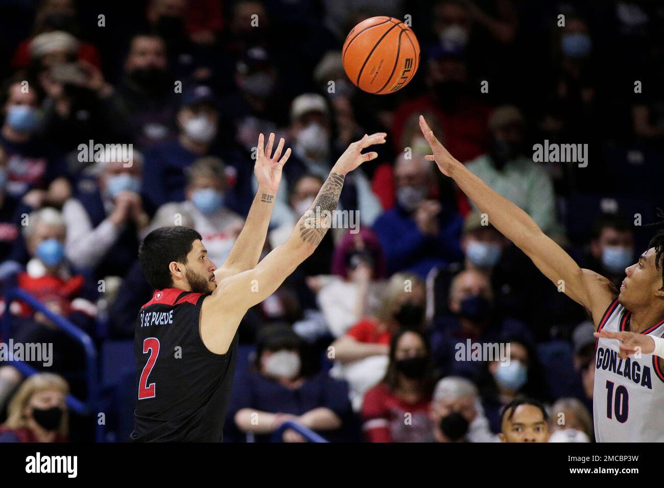 Loyola Marymount guard Joe Quintana (2) shoots over Gonzaga guard ...