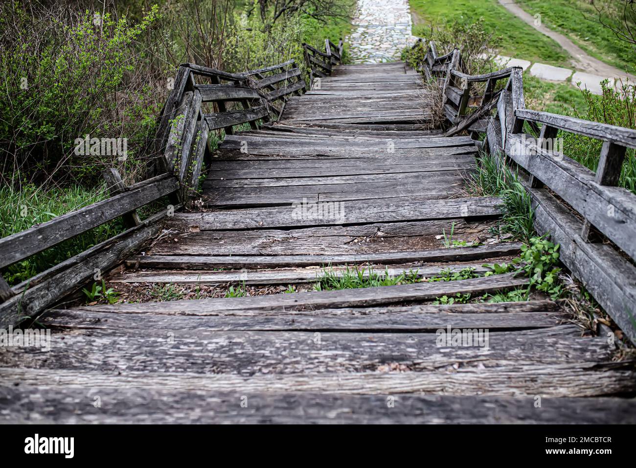 Staircase of a wooden bridge. Wooden staircase from the mountain Stock ...