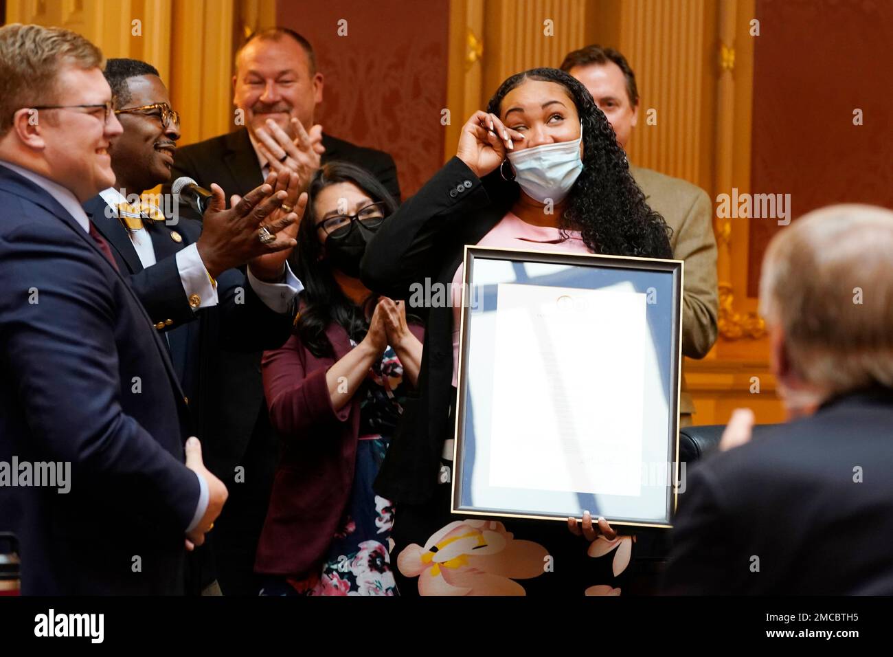 2002 Virginia Teacher of the Year, Daphne Fulson, right, wipes. Tear as ...