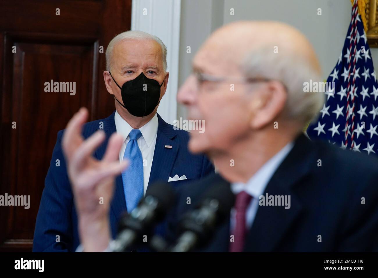 President Joe Biden listens as Supreme Court Associate Justice Stephen ...