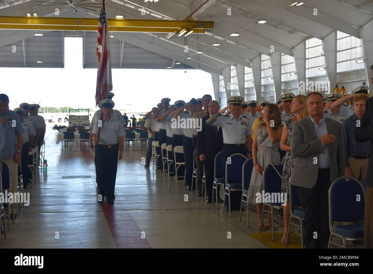 The color guard presents the colors at the change of command ceremony ...
