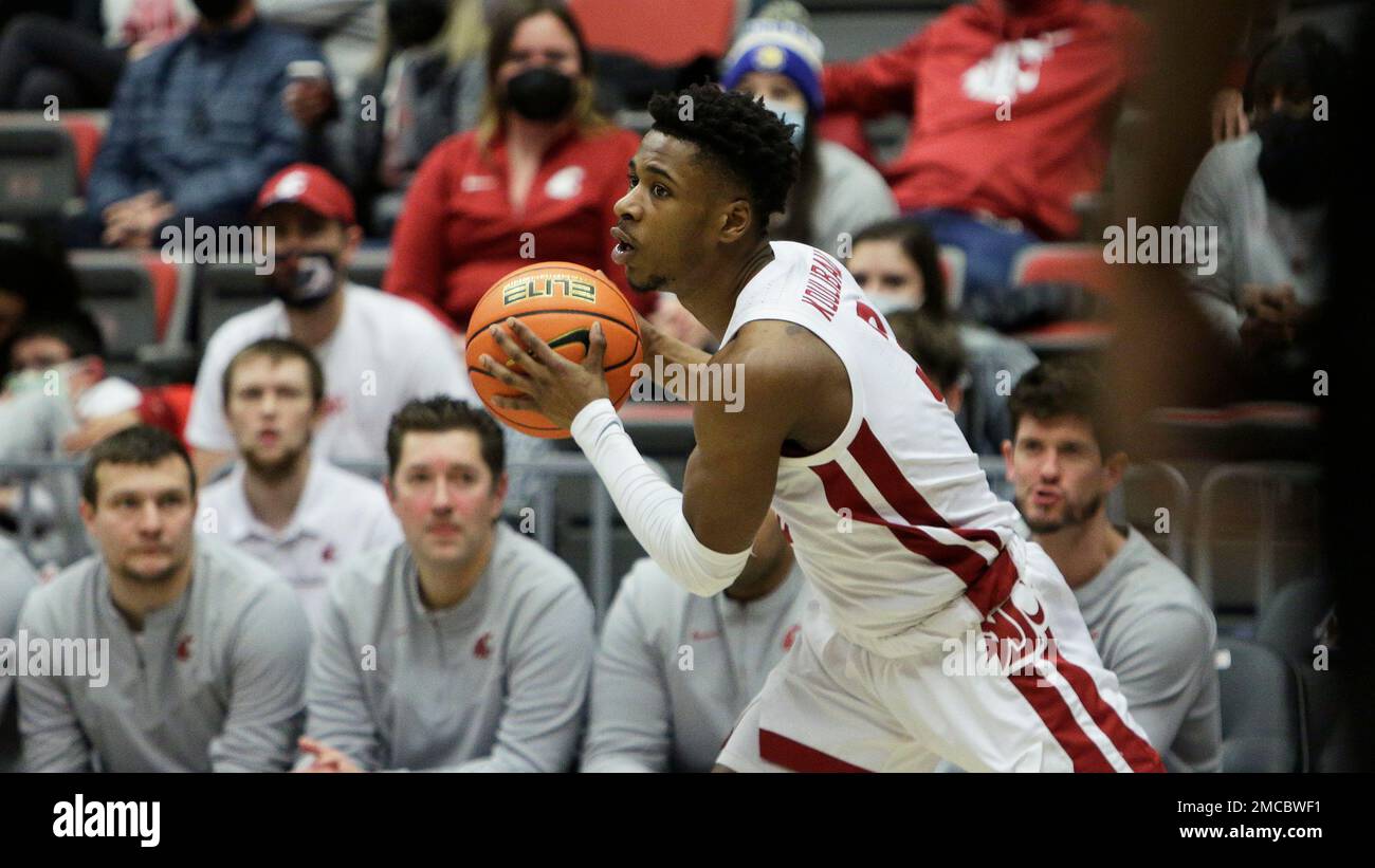 Washington State guard Jefferson Koulibaly controls the ball during the ...