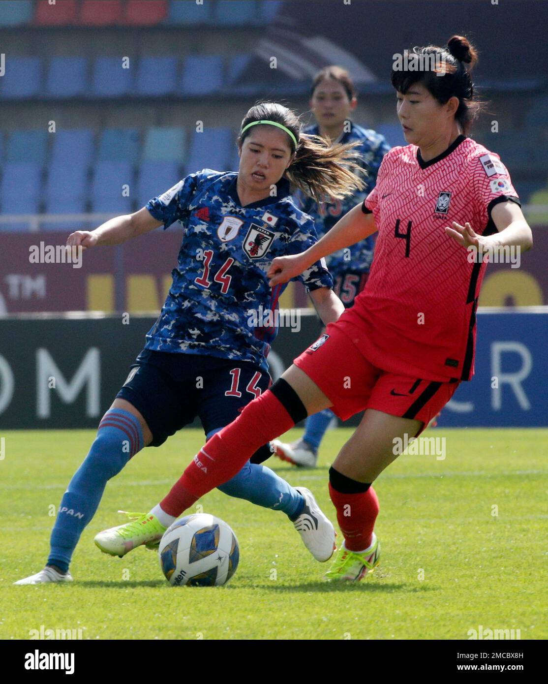 South Korea S Y Shim, right, and Japan's Yui Hasegawa play during the ...