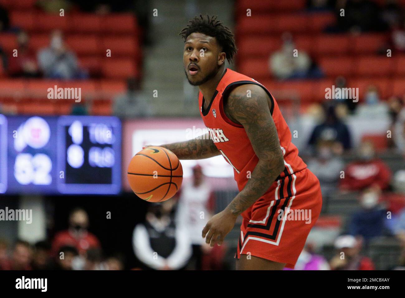 Utah guard David Jenkins Jr. controls the ball during the second half ...