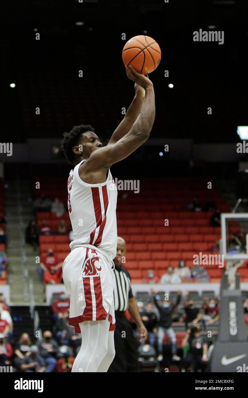 Washington State guard TJ Bamba shoots during the first half of an NCAA ...