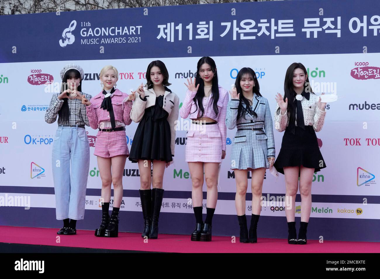 South Korean K-Pop group STACY pose as they arrive to attend Gaon Chart ...