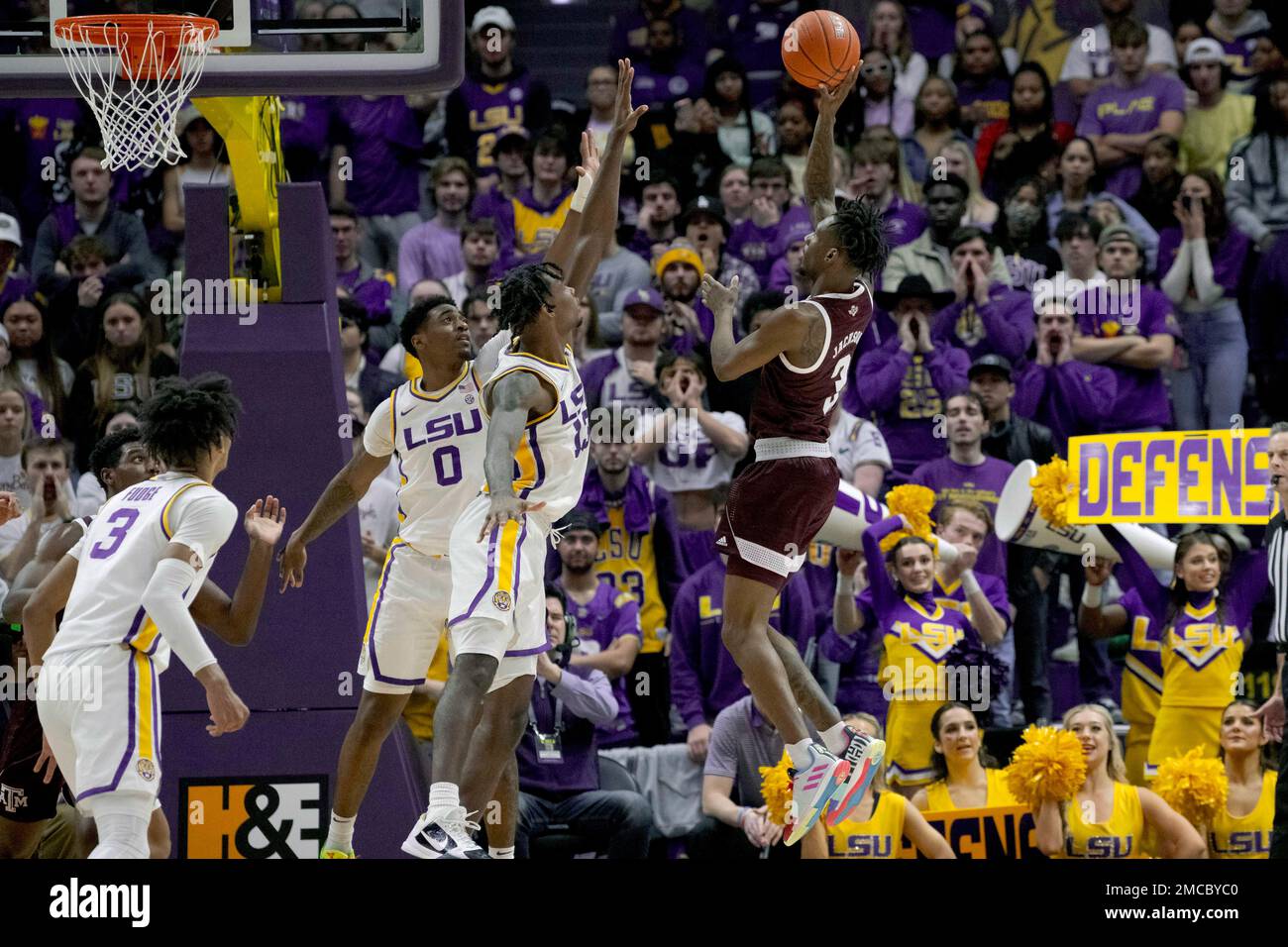 Texas A&M guard Quenton Jackson (3) shoots over LSU forward Tari Eason ...