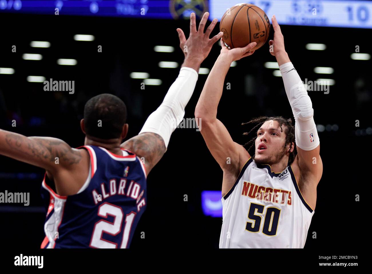 Denver Nuggets forward Aaron Gordon (50) shoots over Brooklyn Nets ...