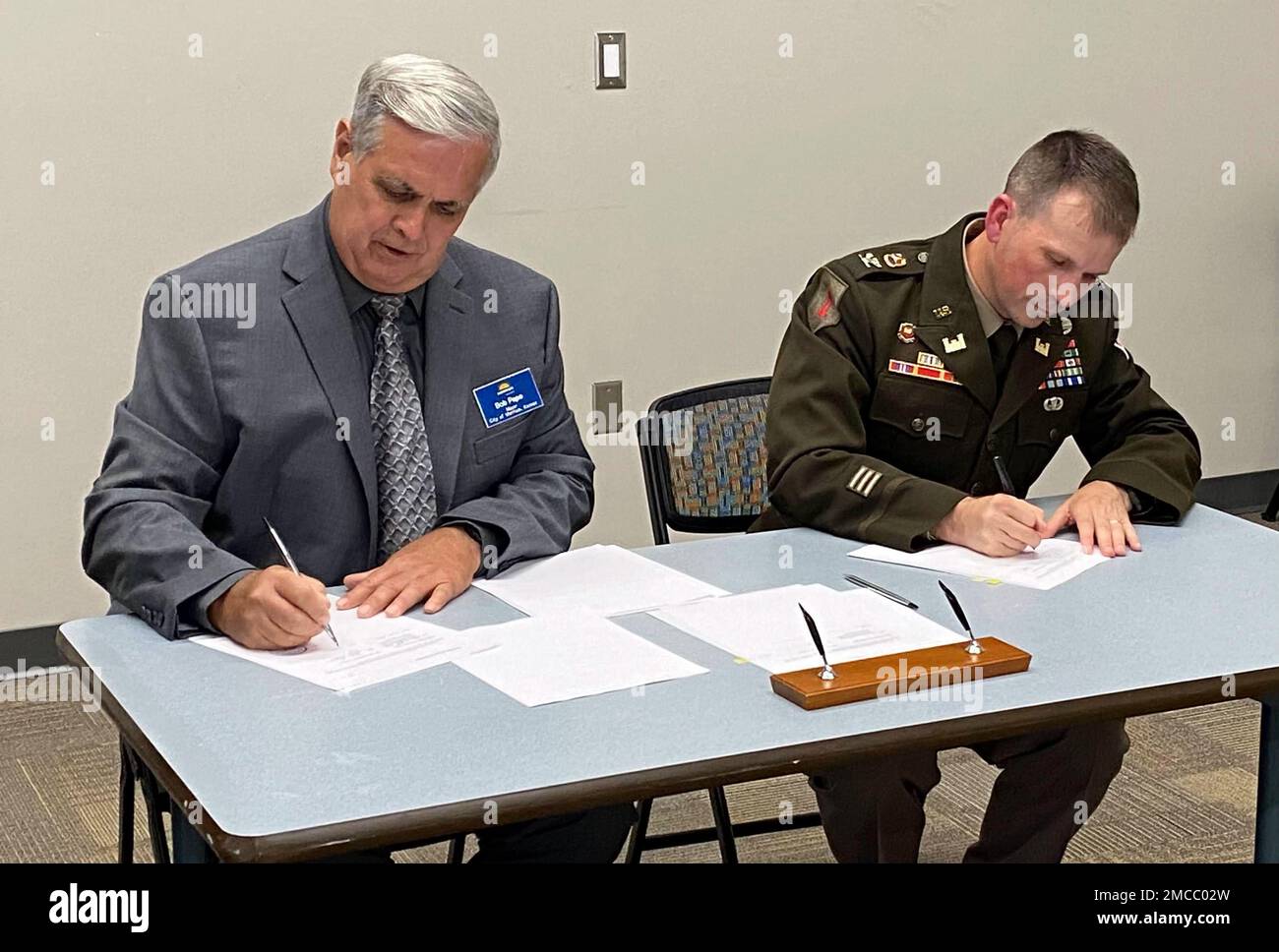 Bob Pape, City of Merriam mayer (left), and Col. Travis Rayfield, U.S ...