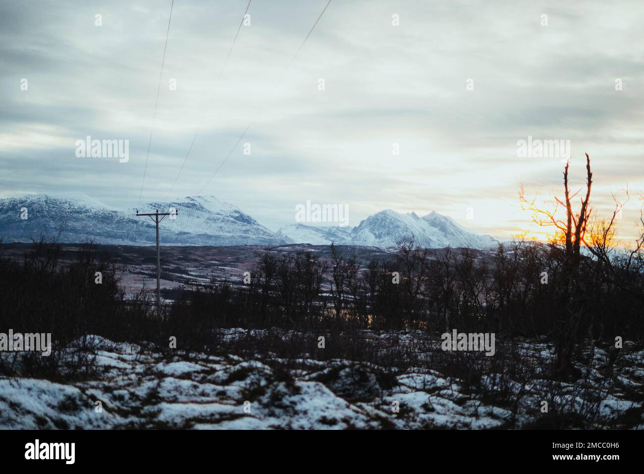 The rocky mountains covered with snow during scenic polar night, Tromso ...