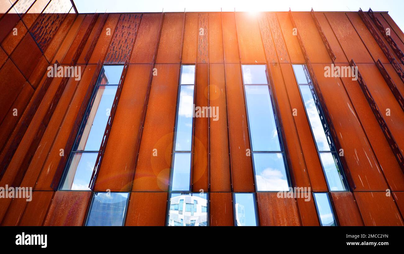 Modern facade covered in unique Corten steel and glass materials Stock ...