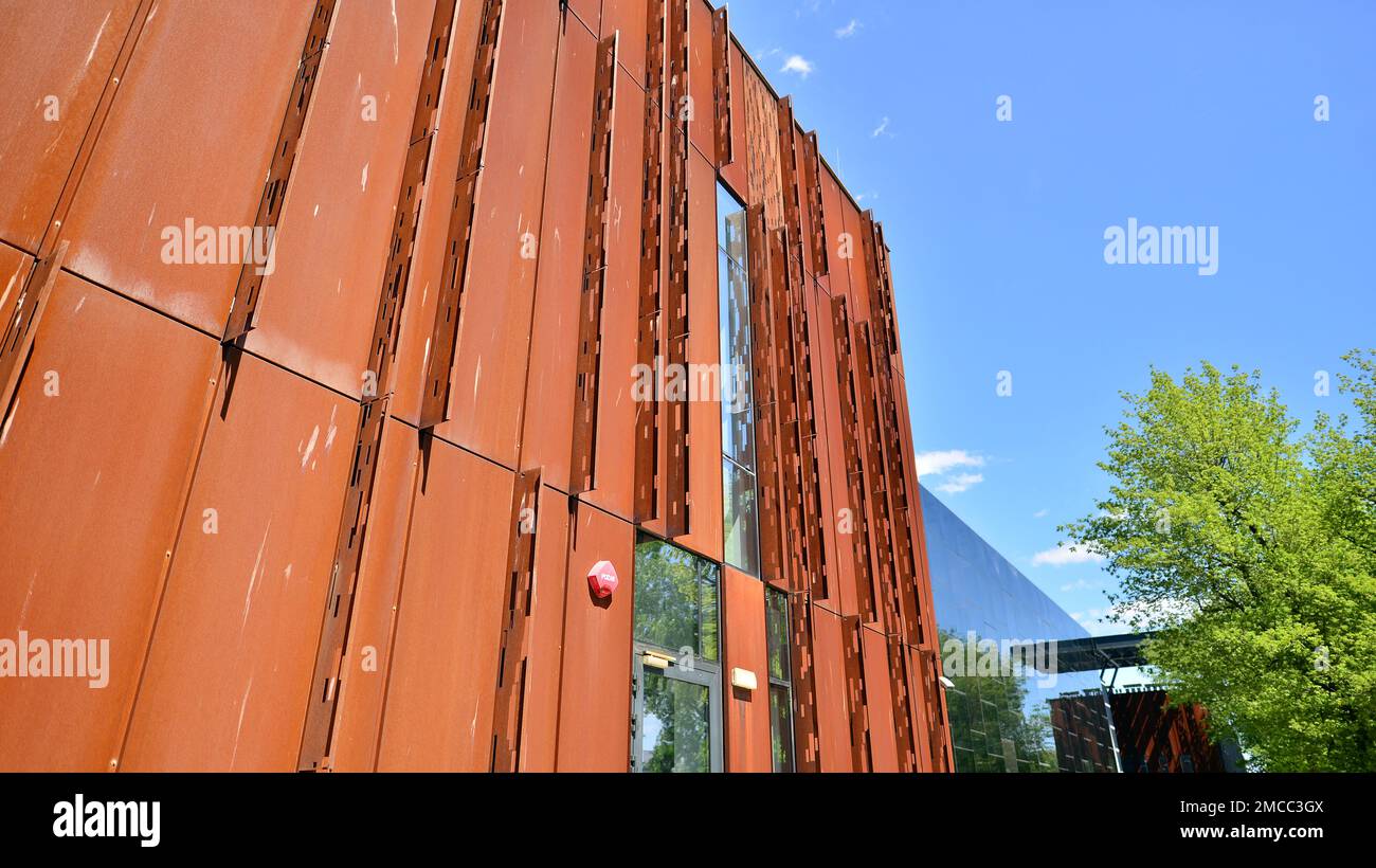 Modern facade covered in unique Corten steel and glass materials Stock ...