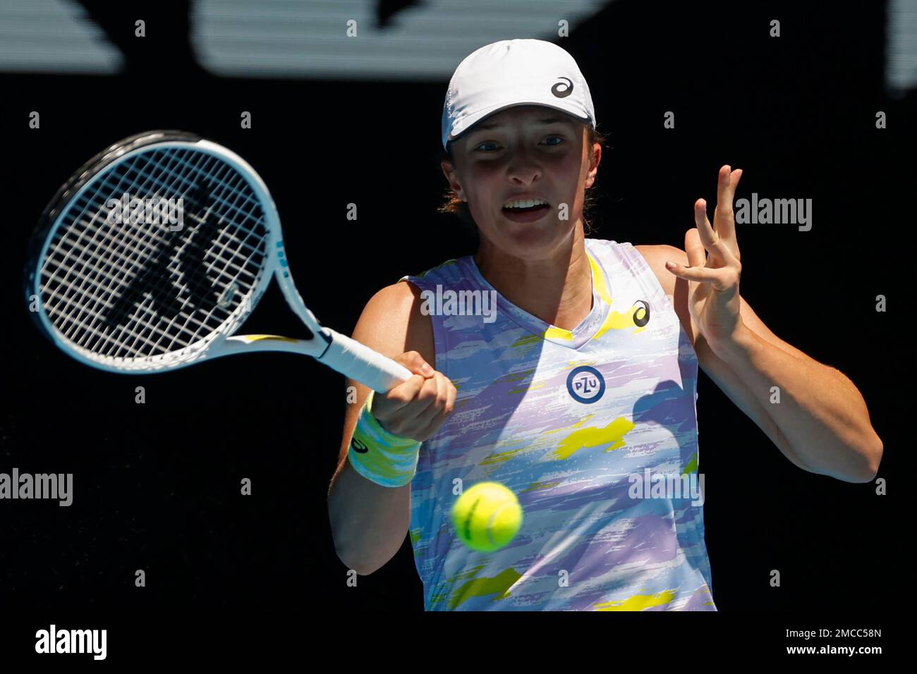 Iga Swiatek of Poland plays a backhand return to Kaia Kanepi of Estonia ...