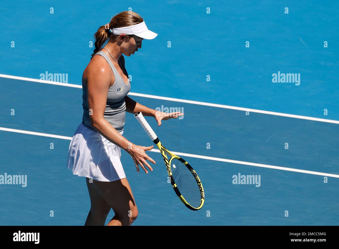 Danielle Collins of the U.S. bounces her racket in frustration during ...