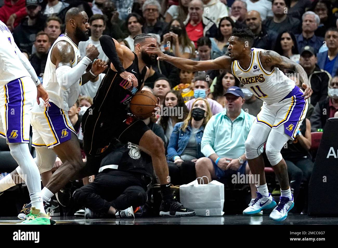 Los Angeles Lakers forward LeBron James, left, and guard Malik Monk (11 ...