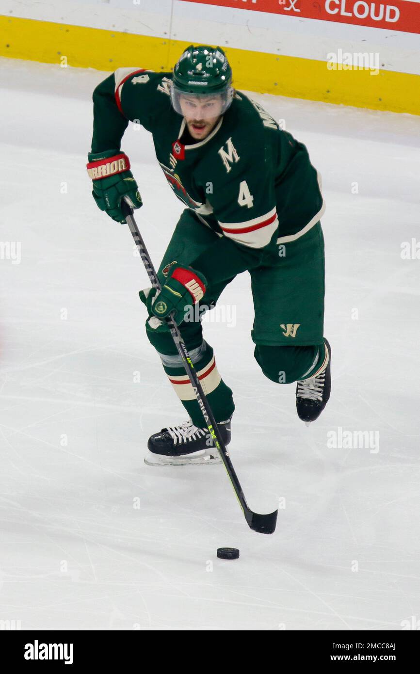 Minnesota Wild defenseman Jon Merrill plays during an NHL hockey game ...