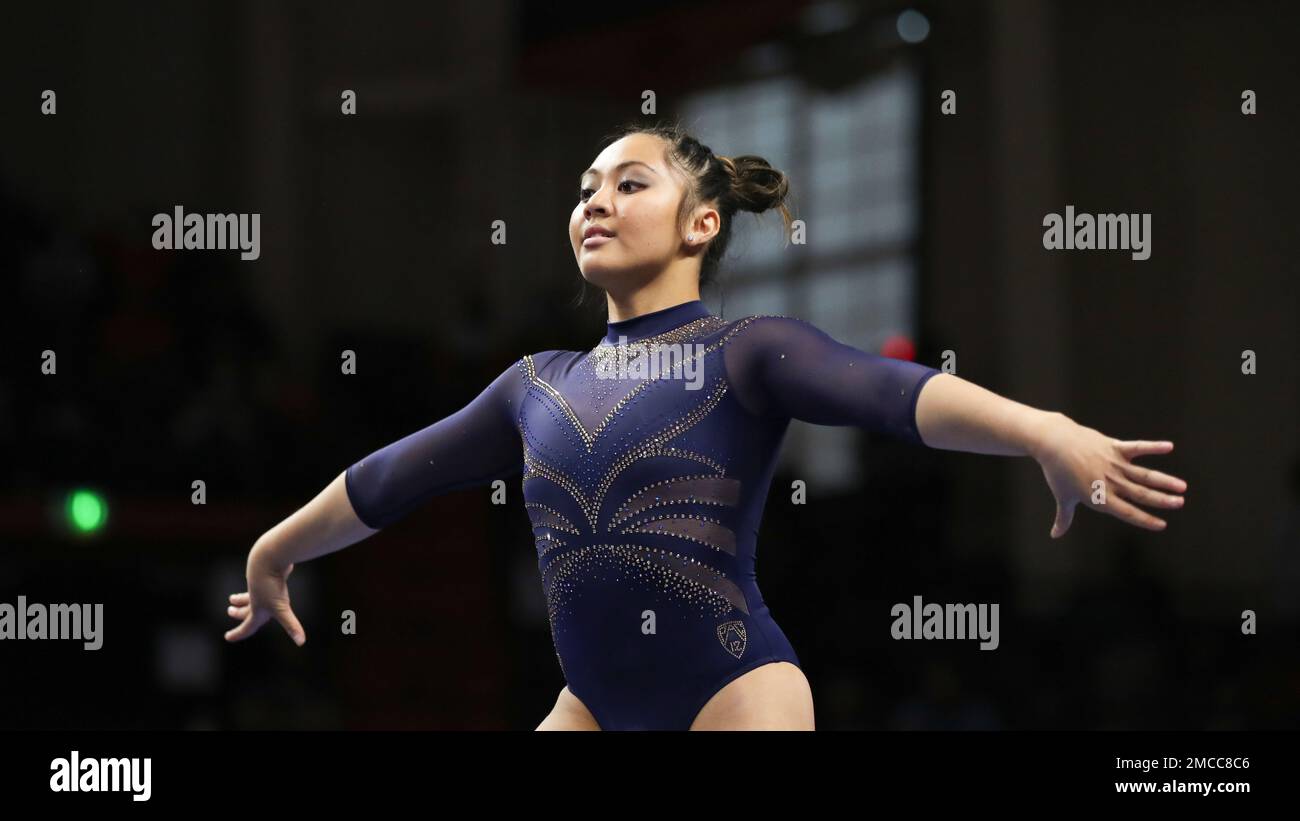 UCLA's Emma Malabuyo competes on the balance beam during an NCAA ...
