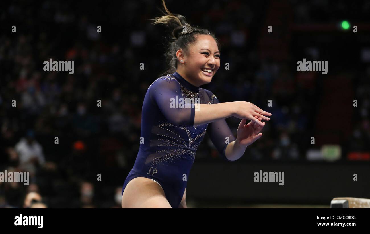 UCLA's Emma Malabuyo competes on the balance beam during an NCAA ...