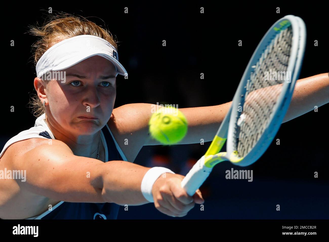 Barbora Krejcikova of the Czech Republic plays a backhand return to ...