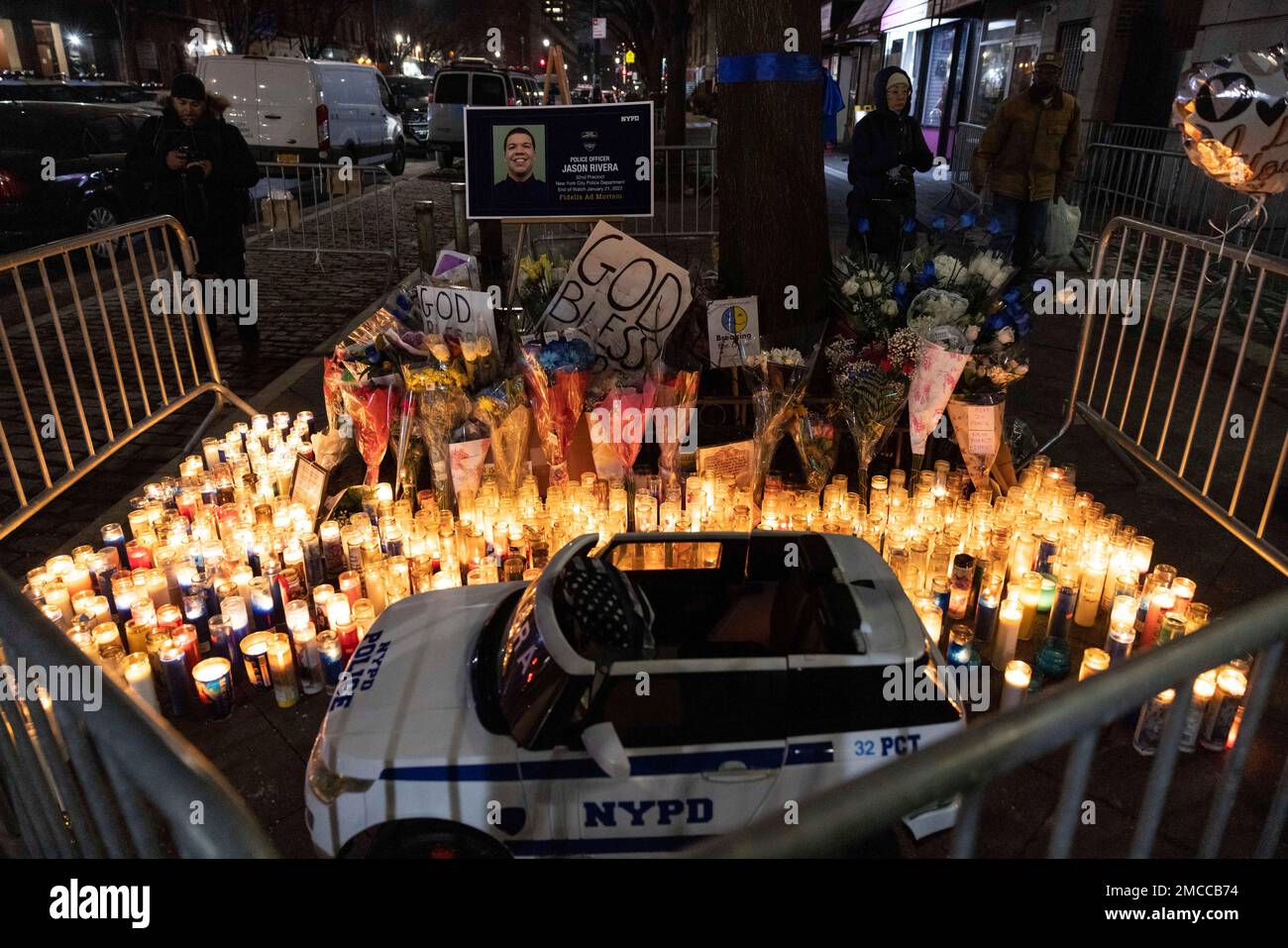 A makeshift memorial is seen outside the New York City Police ...