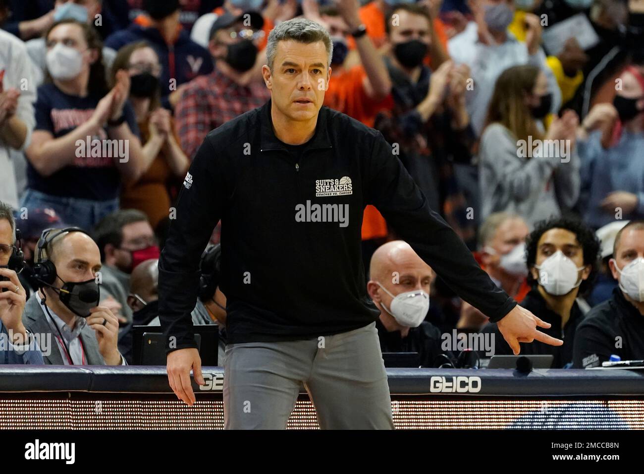 Virginia head coach Tony Bennett directs his team during the first half ...