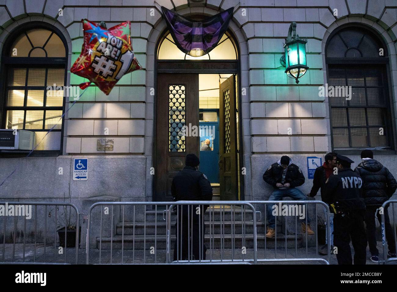 Police officers are seen outside the New York City Police Department's ...