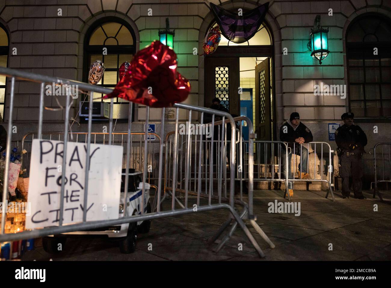 A makeshift memorial is setup outside the New York City Police ...