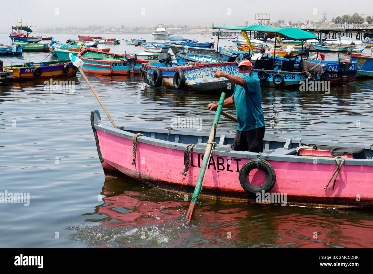 Fisherman Maximo Castro points south, the direction from which came the ...
