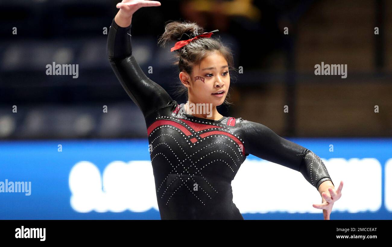 Denver's Bella Mabanta performs on the beam during an NCAA gymnastics ...