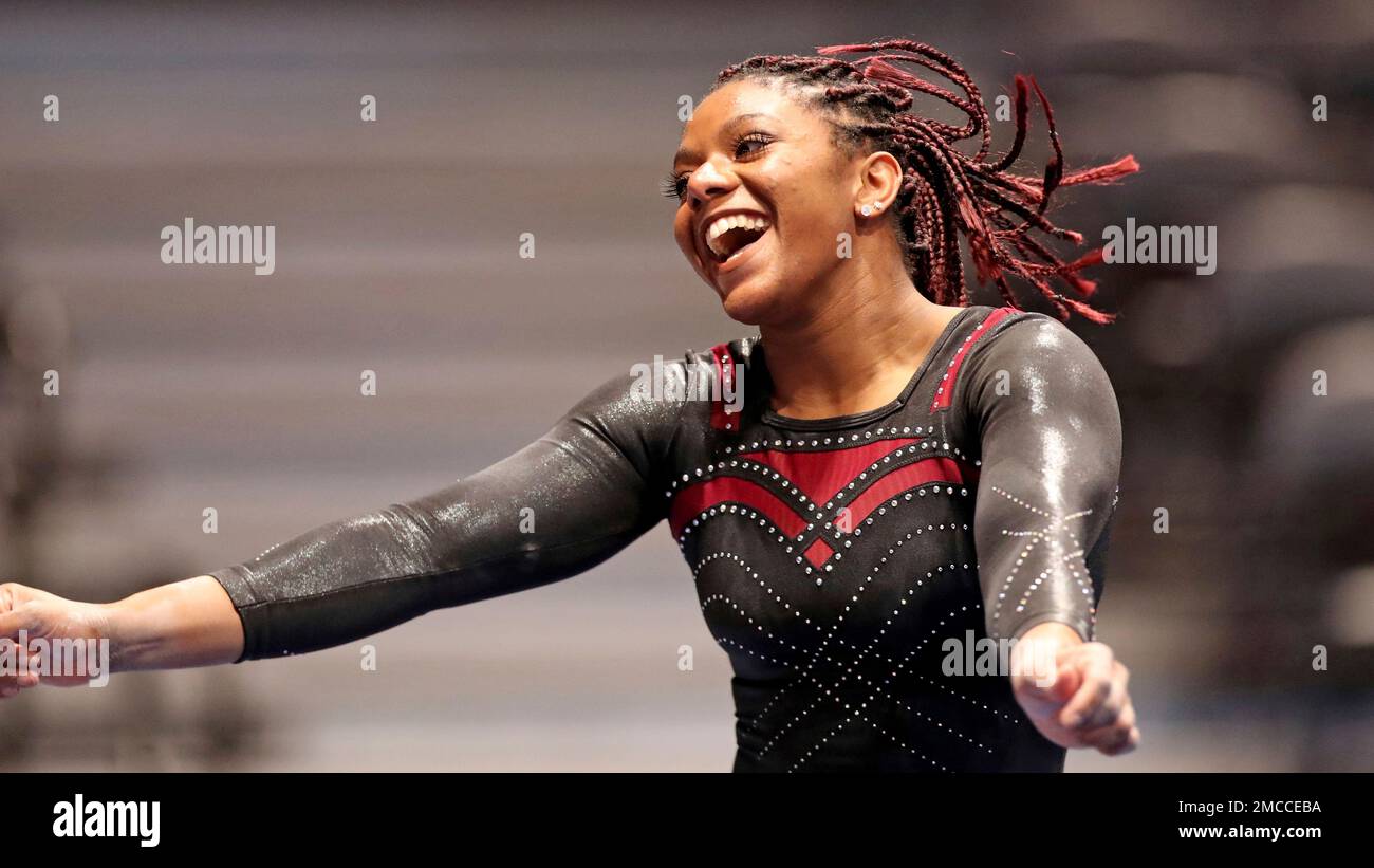Denver's Lynnzee Brown performs the floor exercise during an NCAA ...