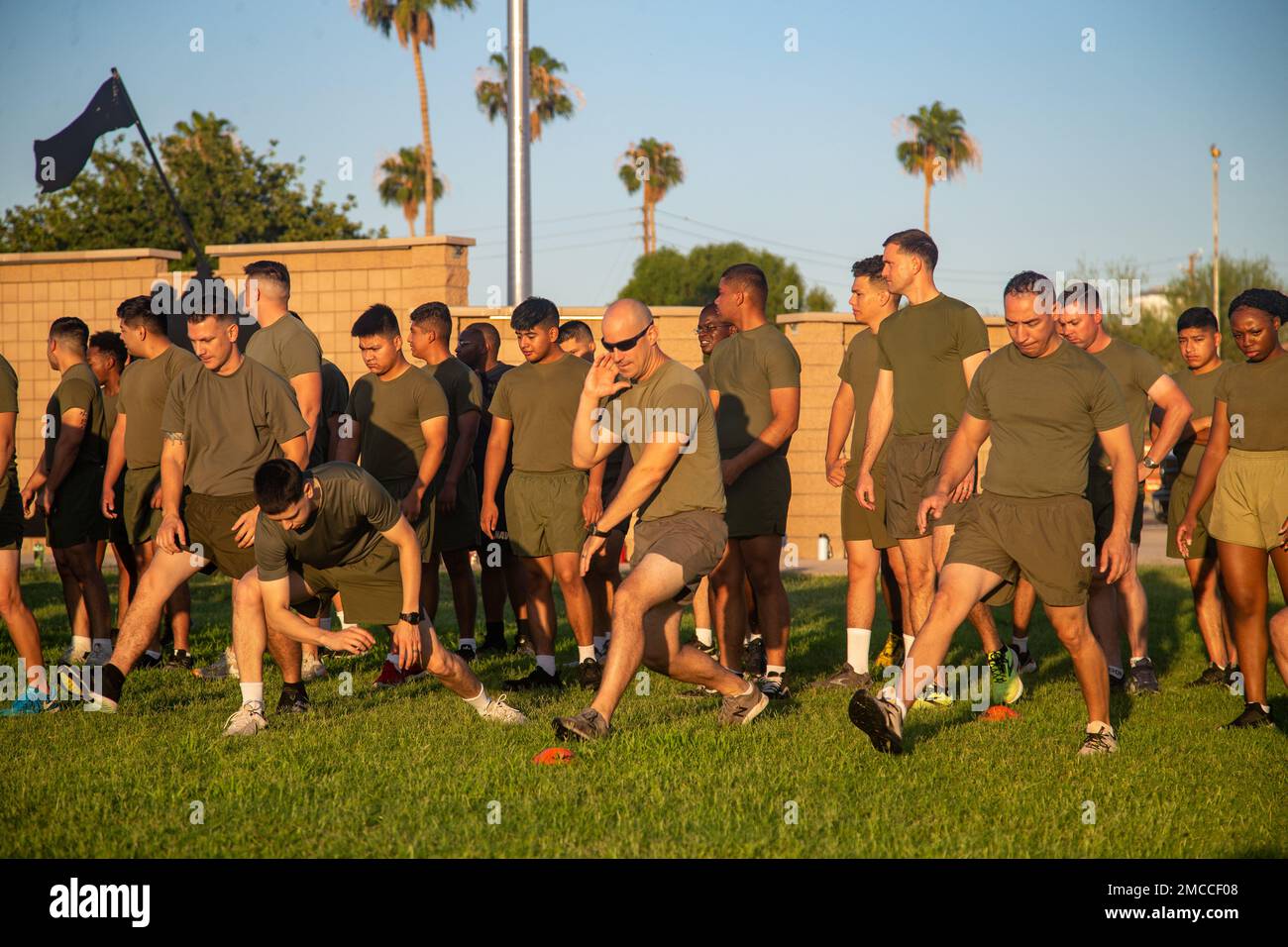 U.S. Marines with Headquarters and Headquarters Squadron, conduct warm ...