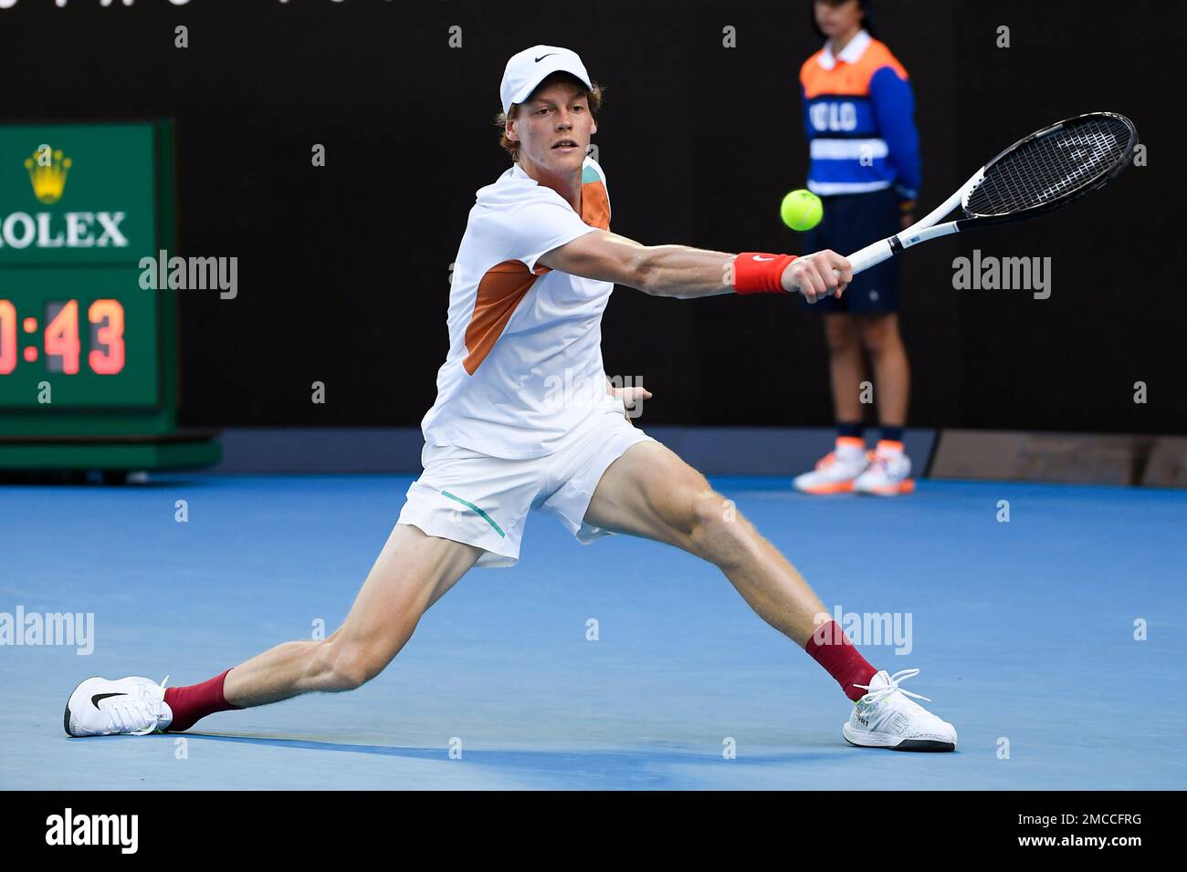 Jannik Sinner of Italy makes a backhand return to Alex de Minaur of ...
