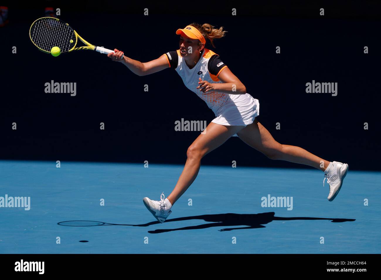 Elise Mertens of Belgium makes a forehand return to Danielle Collins of ...