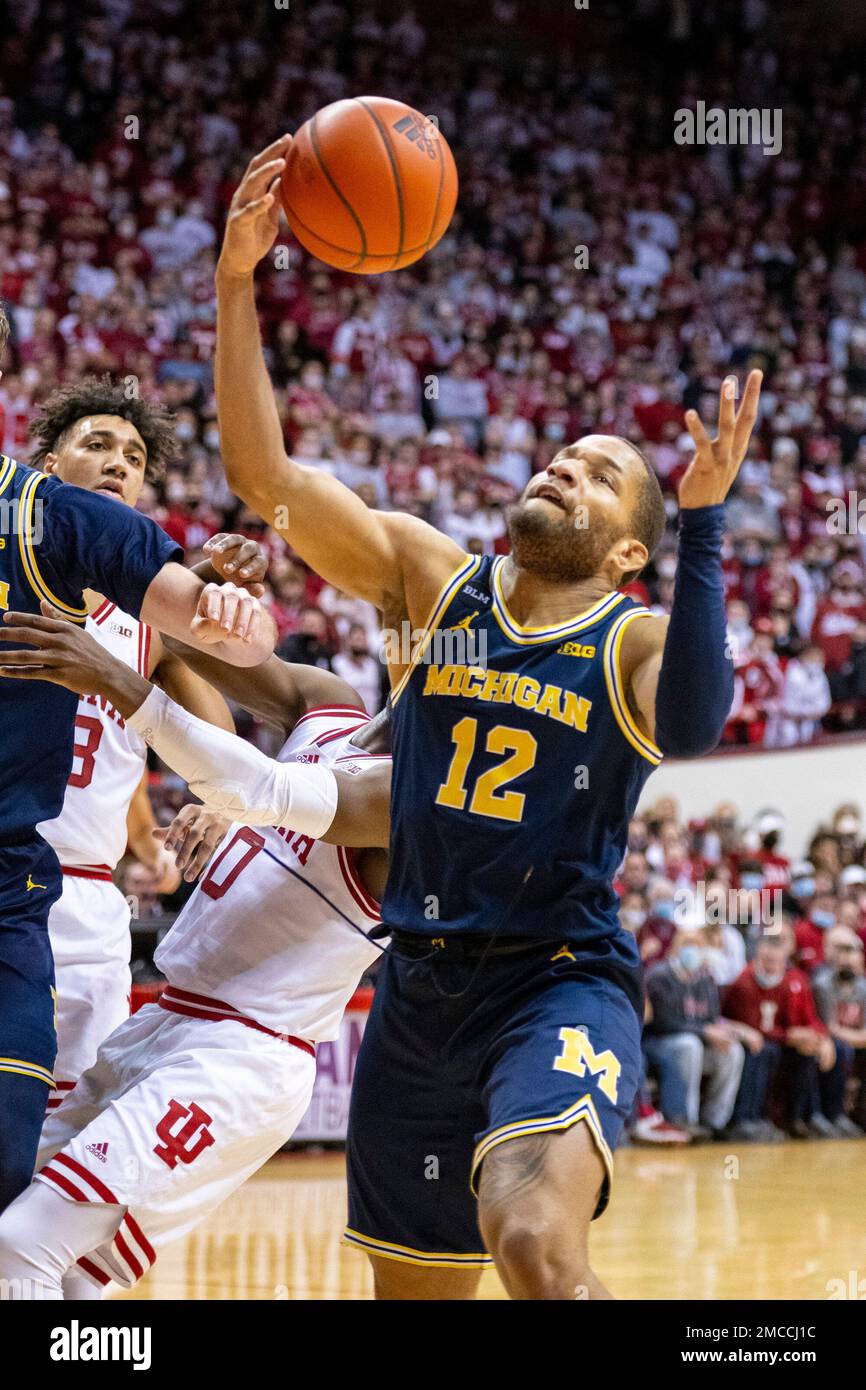 Michigan guard DeVante' Jones (12) pulls in a rebound during the second ...